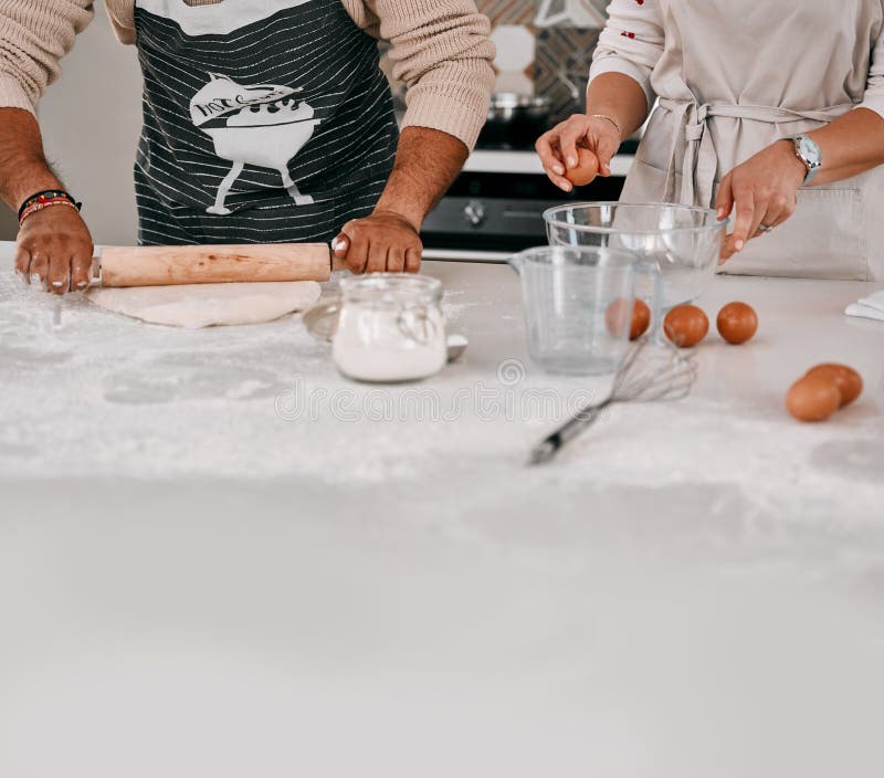 Teamwork Makes the Meal Prep Work. a Couple Baking Together at Home ...