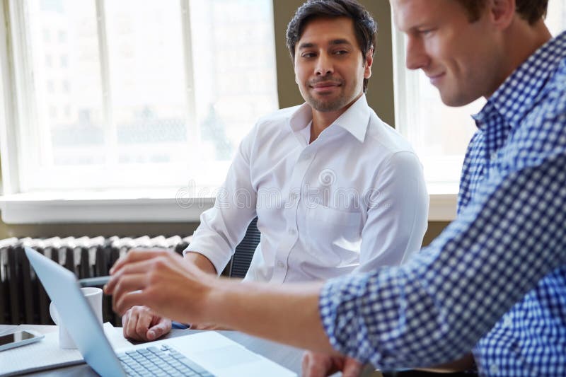 Teamwork Makes Their Business Grow. Businessmen Working in Their Office ...