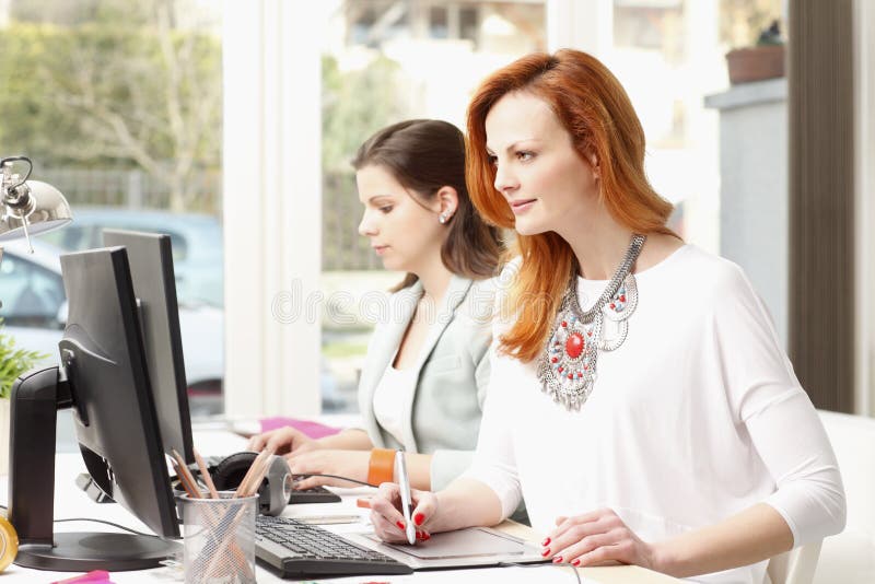 Teamwork At Modern Graphic Studio Stock Image - Image of looking ...