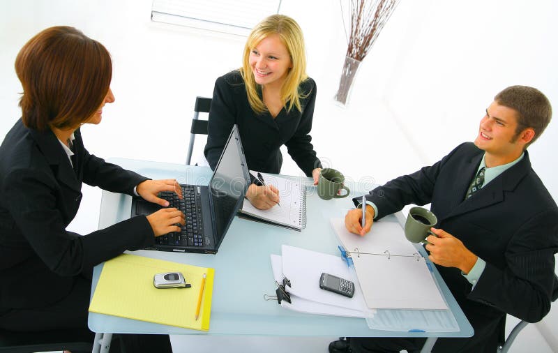 Teamwork in the Office stock image. Image of teamwork - 6529595