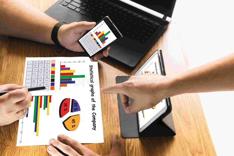 Teamwork in the Office Analyzing Statistical Graphs of the Company`s ...