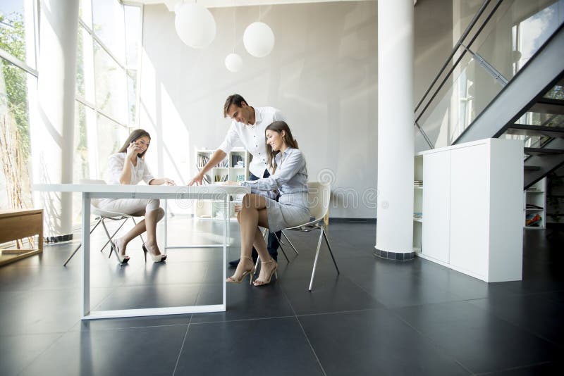 Teamwork in the office stock image. Image of teamwork - 64888859