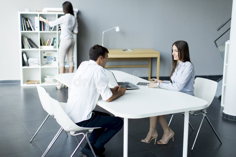 Teamwork in the office stock photo. Image of working - 64889012