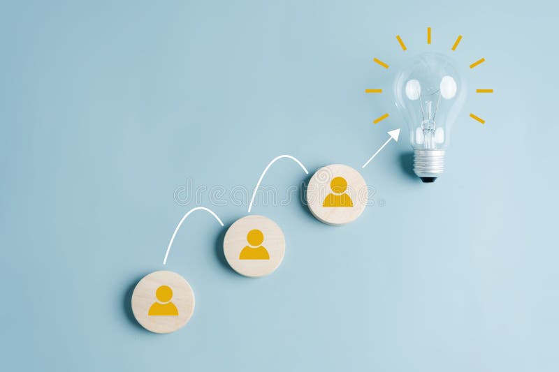 Teamwork and Partner Management with Lightbulb. Stock Image - Image of ...