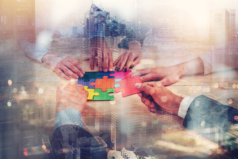 Teamwork of Partners Connect Puzzle Pieces As Integration and Startup ...