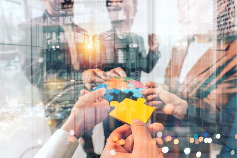 Teamwork of Partners Connect Puzzle Pieces As Integration and Startup ...