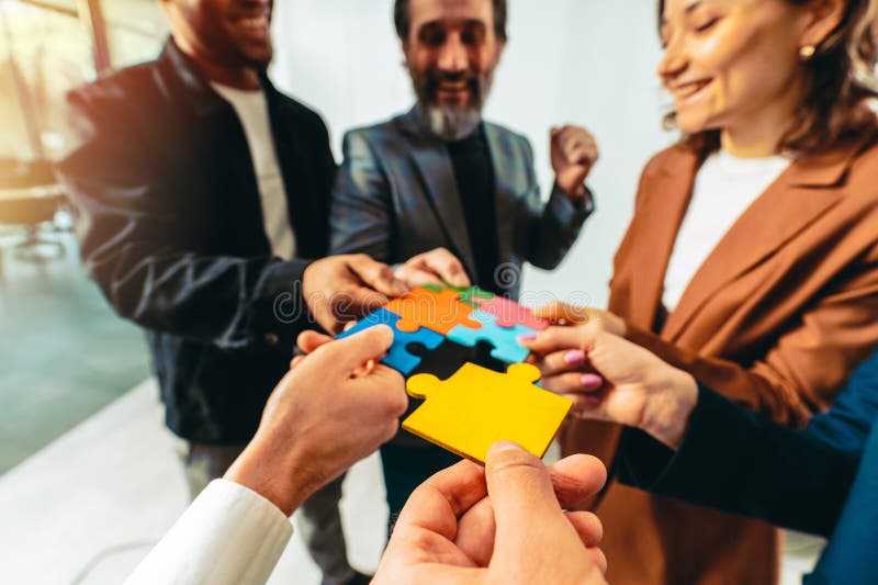 Teamwork of Partners Connect Puzzle Pieces As Integration and Startup ...