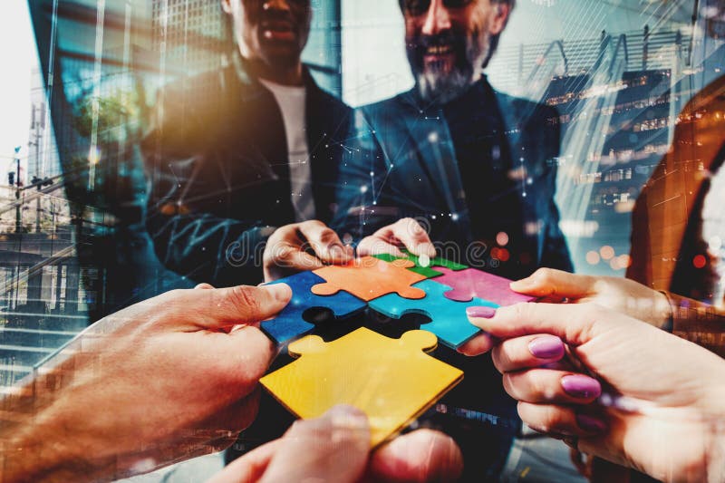 Teamwork of Partners Connect Puzzle Pieces As Integration and Startup ...