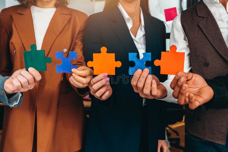 Teamwork of Partners Connect Puzzle Pieces As Integration and Startup ...