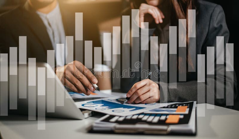 Teamwork Process, Business Team Using a Calculator To Calculate the ...