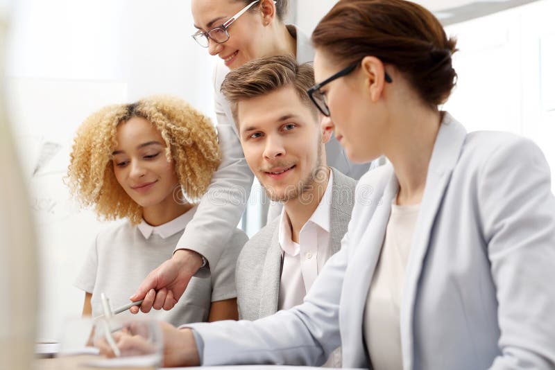 Teamwork on the project stock photo. Image of project - 83867404