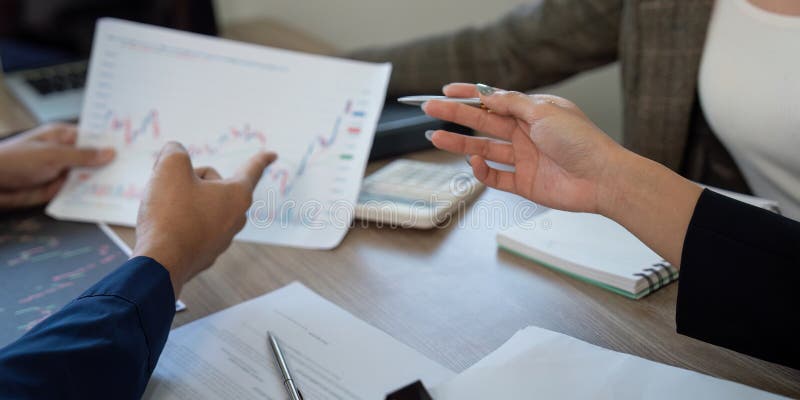 Teamwork in Tax Analysis. Professionals Collaborating on Financial ...