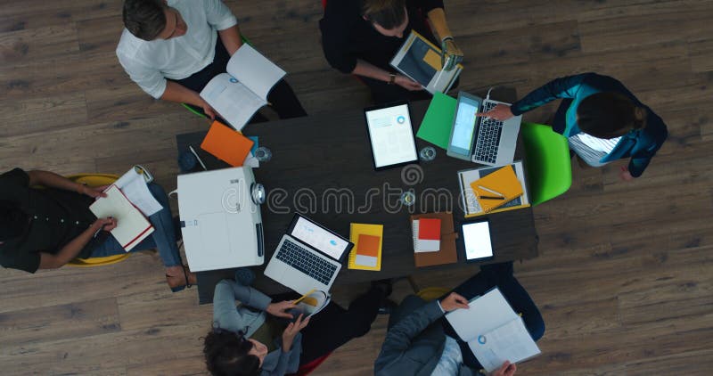 Teamwork, Tech Planning and Documents Top View of Office Team Working ...