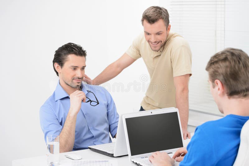 Teamwork. Three Business People Working on the Project Together Stock ...