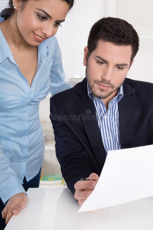 Teamwork between Two Business Colleagues at Office. Stock Photo - Image ...