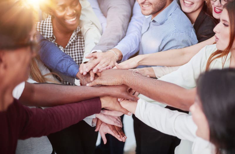Multiethnic College Students Fold Their Hands in Place Stock Photo ...