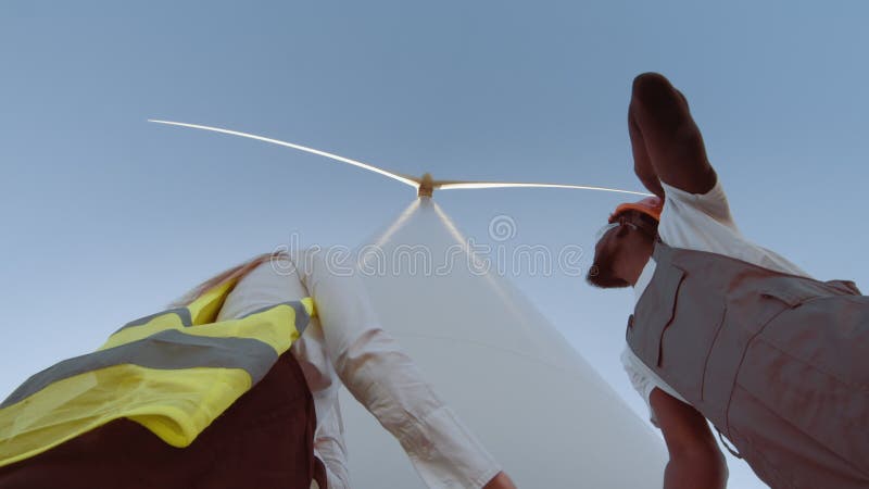 Teamwork of Windmill Engineer Group, Worker Working, Shaking Hands on ...