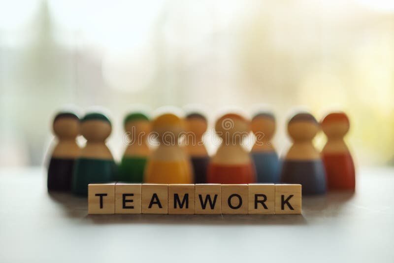 TEAMWORK Word on Wooden Blocks with Business Team Stock Image - Image ...