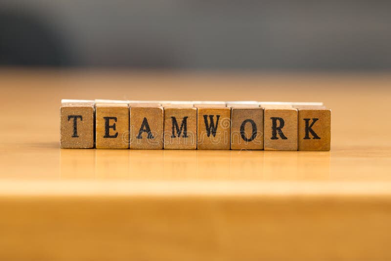 TEAMWORK Word Written on Wooden Blocks on Wooden Table. Concept for ...
