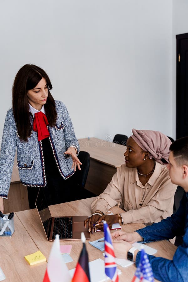 Teamwork. Working in Multiethnic Group of Students. Teacher Study ...