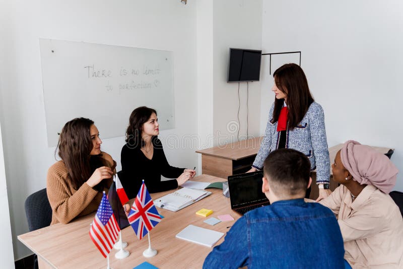 Teamwork. Working in Multiethnic Group of Students. Teacher Study ...