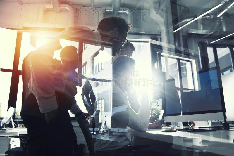 Teamwork Works with a Computer. Concept of Internet Sharing and ...