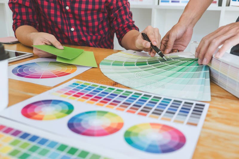 Teamwork of Young Creative Designers Working on Project Together and ...