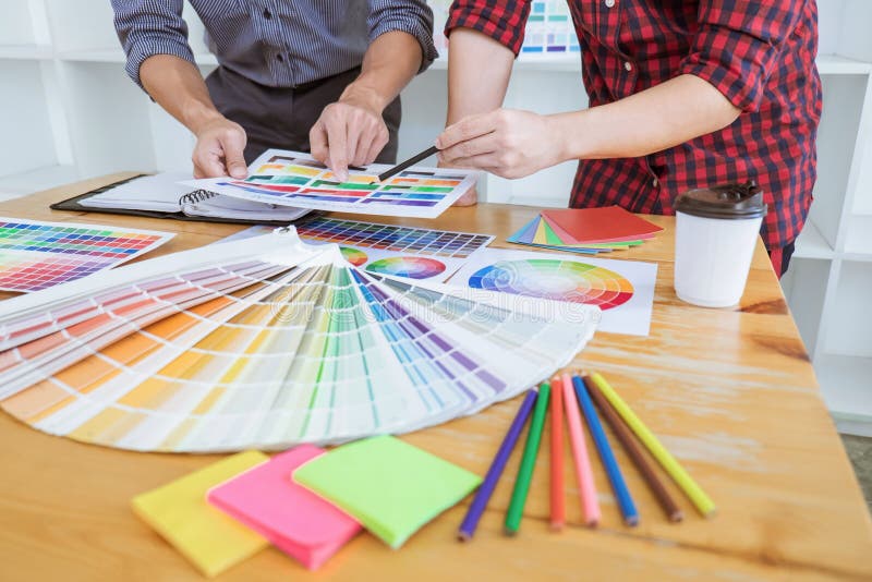 Teamwork of Young Creative Designers Working on Project Together and ...