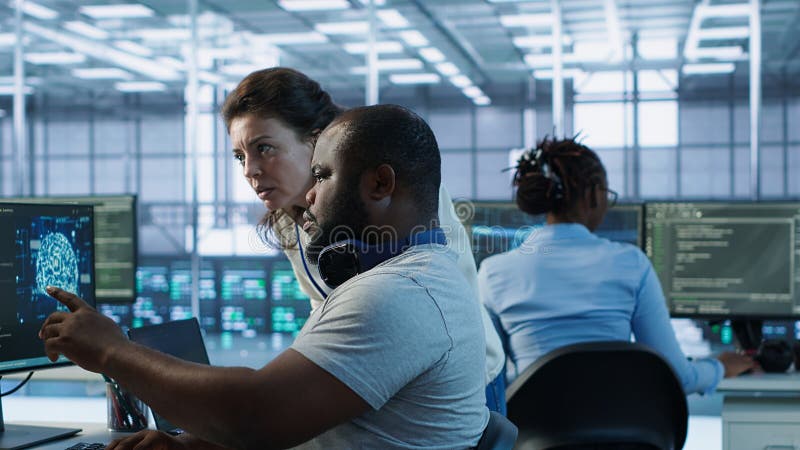 Teamworking Colleagues Updating AI Systems on PC and Laptop Stock Photo - Image of applications ...