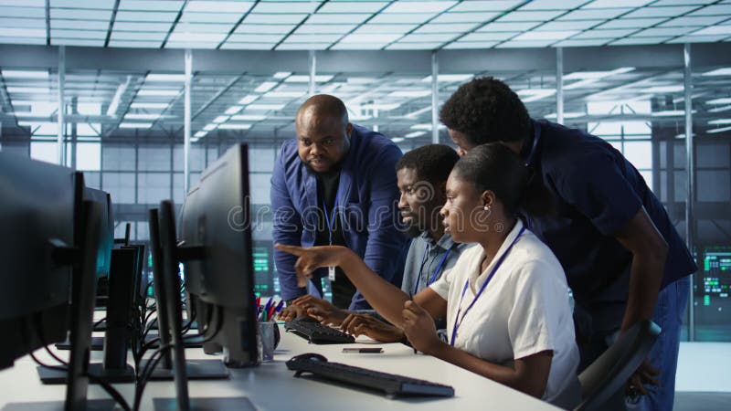 Teamworking Engineers Talking in Server Room, Doing Brainstorming Stock ...