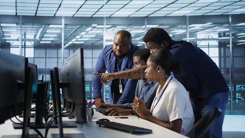 Teamworking Engineers Talking in Server Room, Doing Brainstorming Stock ...