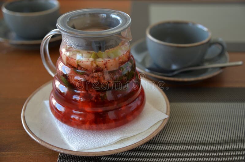 Teapot with Apple, Raspberry and Mint Fruit Tea on Table Stock Image ...