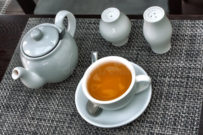 Teapot and cap of tea stock image. Image of culture, pouring - 29735343
