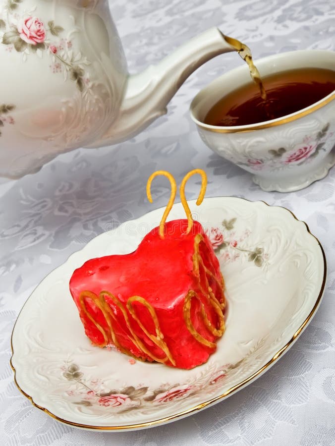 Teapot, Cup of Tea and Cake in Form of a Heart Stock Image - Image of ...