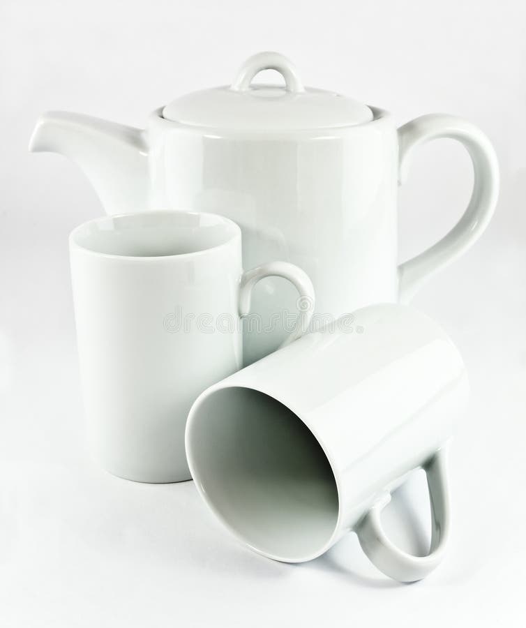 A White Ceramic Teapot and Two Cups on a White Background. Stock Image ...