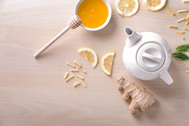 Teapot of Delicious Tea with Ginger, Lemon and Honey on Table Stock ...