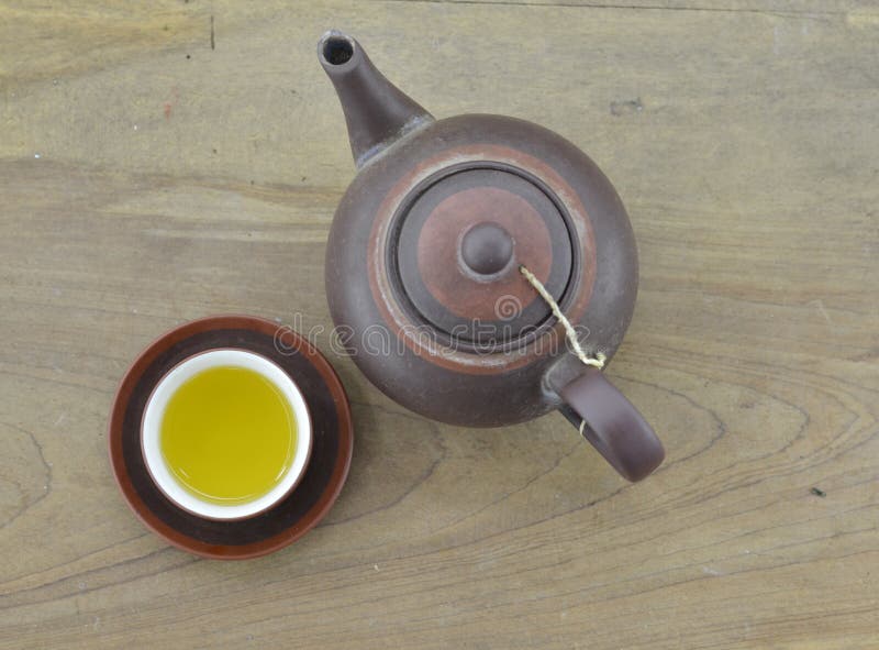 Teapot of Fresh Tea on Wooden Floor Stock Image - Image of background ...