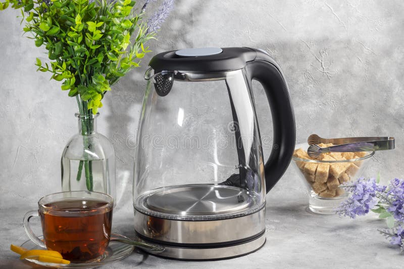 Teapot with Metal Strainer Inside. Kitchen Utensils on Gray Background ...