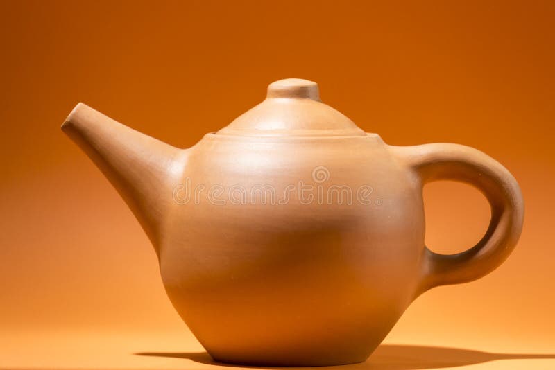 Teapot on orange stock image. Image of force, vintage - 137088693