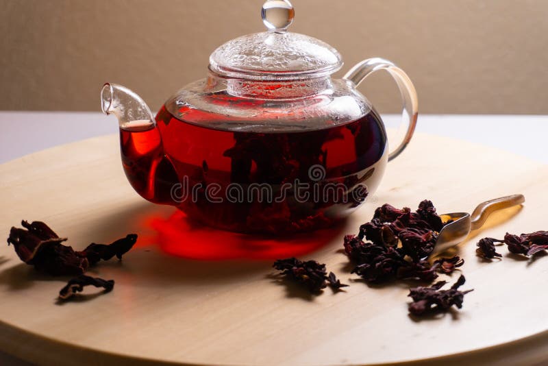 Teapot with Red Karkade Tea on the Table Stock Photo - Image of ...