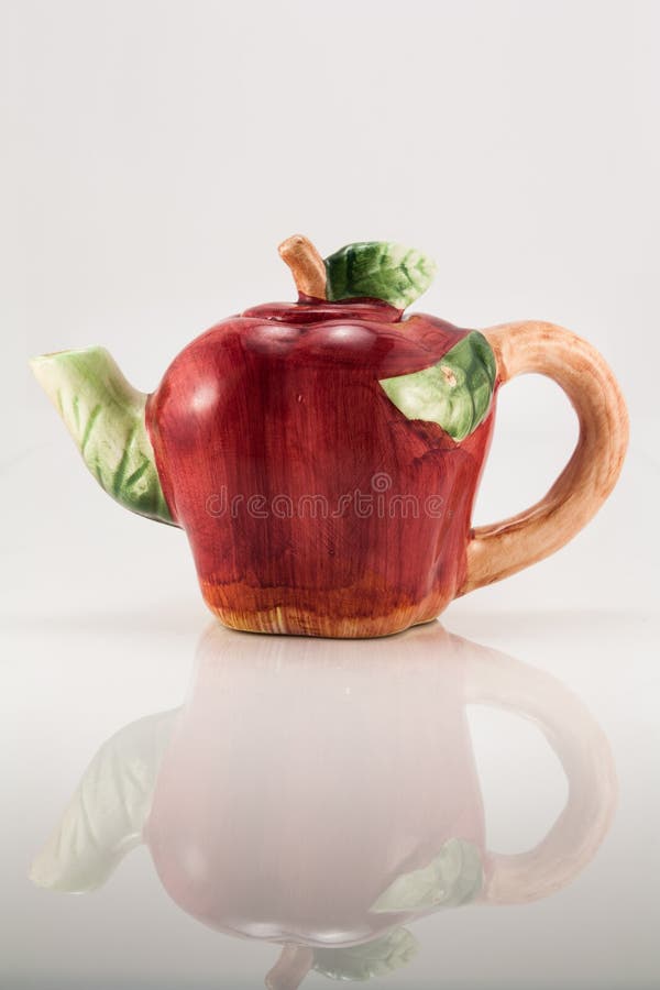 Teapot in the Shape of Apple on White Stock Image - Image of kitchen ...