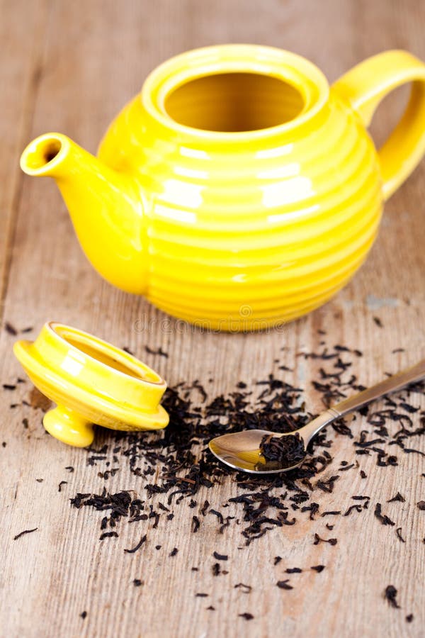 Teapot with spoon and tea stock photo. Image of teapot - 26563646