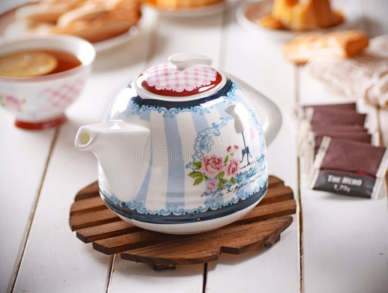 The teapot on the table stock image. Image of china, white - 60969443