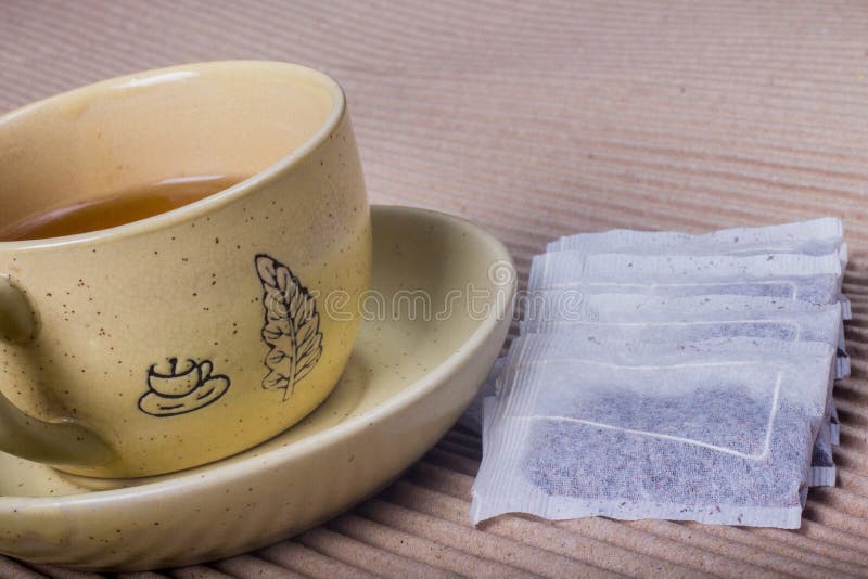 Teapot and tea in paper stock image. Image of kitchenware - 62729587