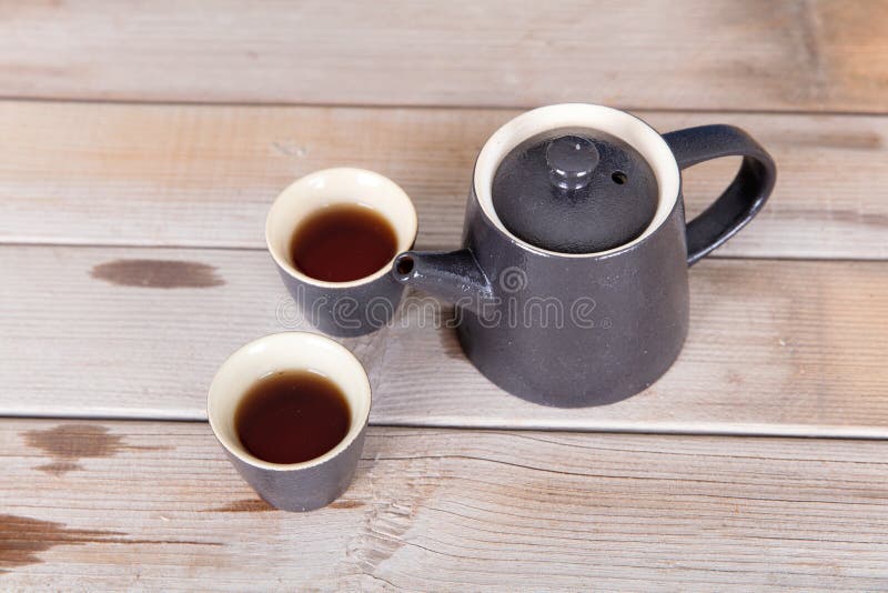 A Teapot and Two Full Cups of Hot Tea Stock Photo - Image of ruddy ...