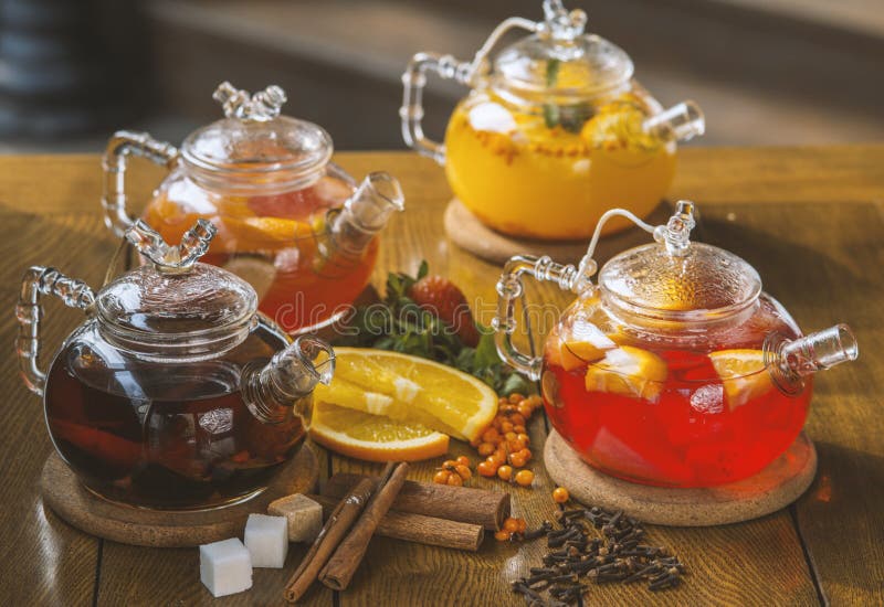 Teapots with Different Fruit Teas on the Table Stock Photo - Image of ...