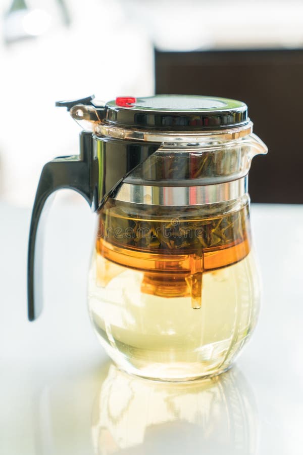 Teapots on white table stock photo. Image of drink, table - 84506880
