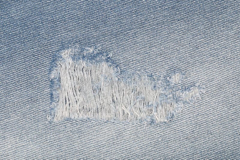 Tear on Blue Jeans for Pattern and Background Stock Image - Image of ...
