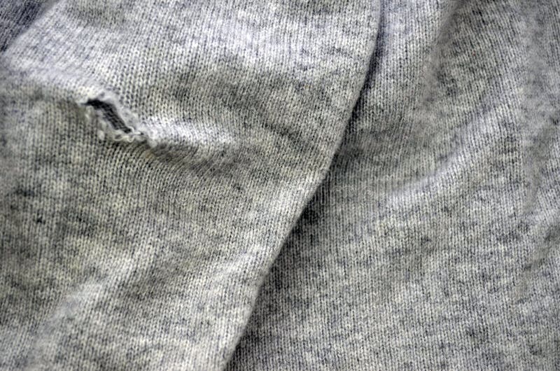 Rip, Tear In Fabric Reveals Light. Stock Image - Image of textured ...