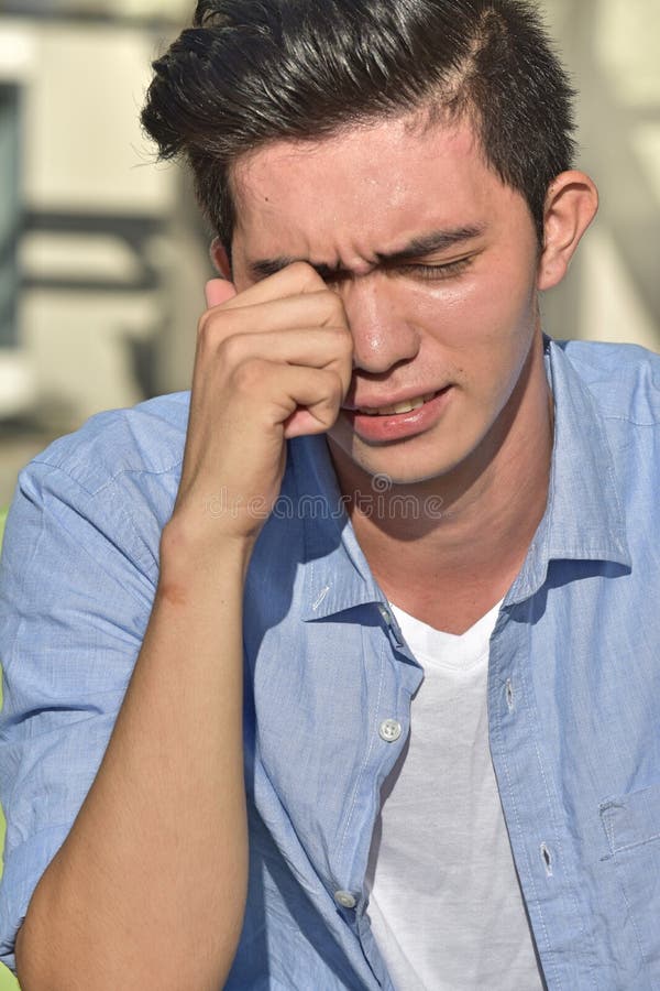 A Tearful Asian Person stock image. Image of sobbing - 142736927